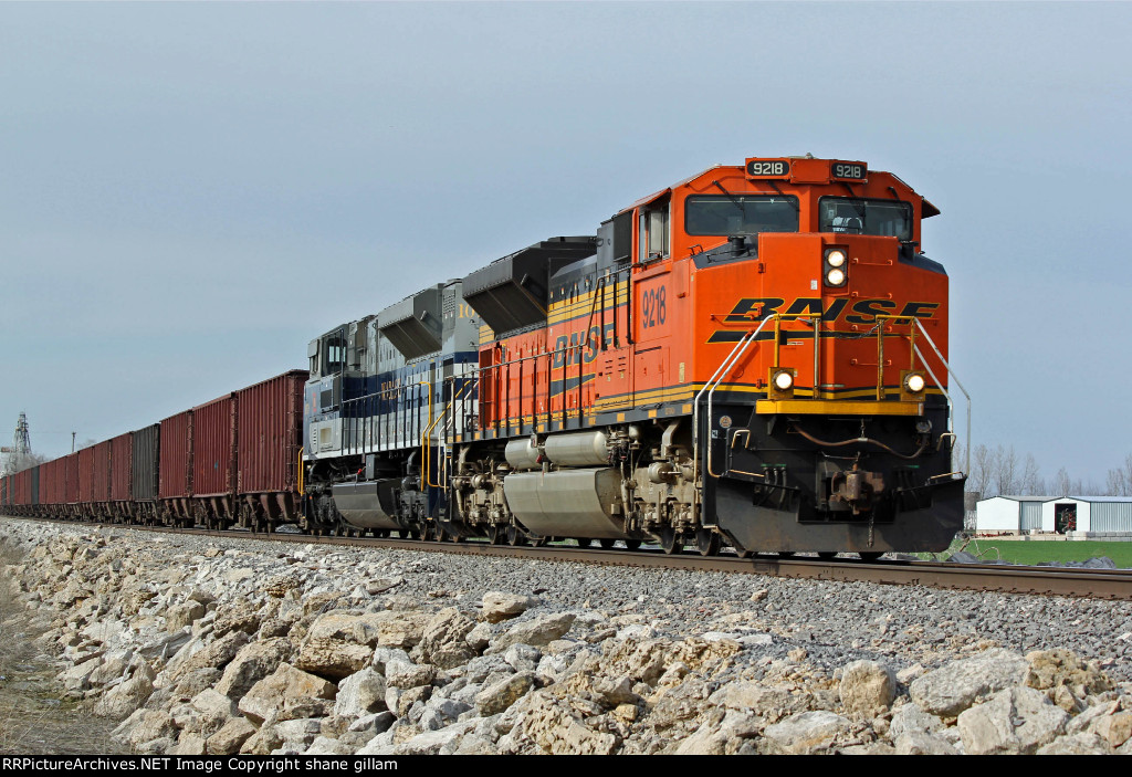 BNSF 9218 Leaves old Monroe with NS 1070.